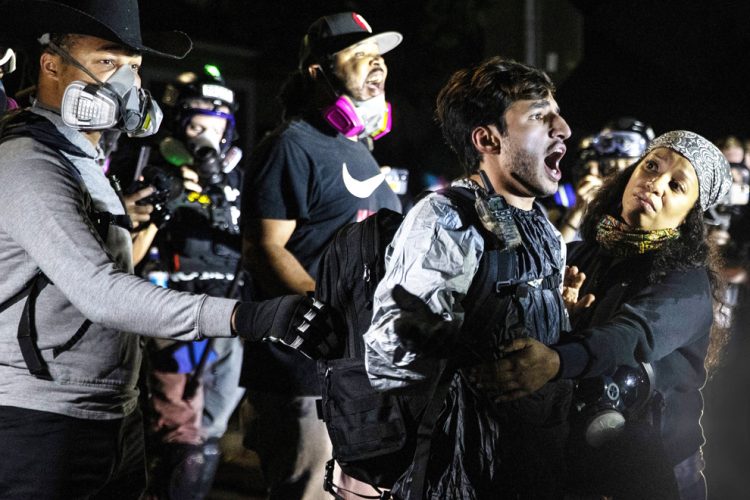 Dozens arrested as violent Portland protests continue | News, Sports ...